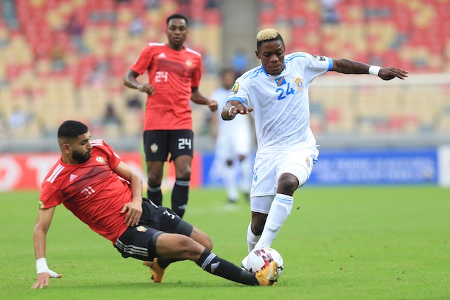 Football – Ciel Ebengo Ikoko of DR Congo challenged by Abdullah ...